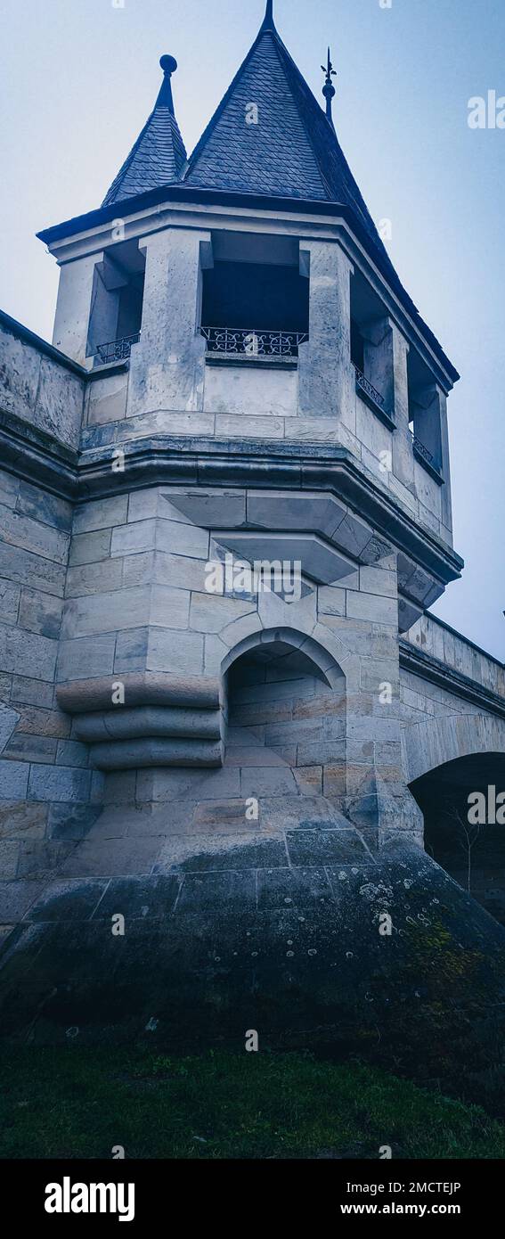 A vertical of the tower on the Saale bridge in Bad Koesen on a gloomy ...