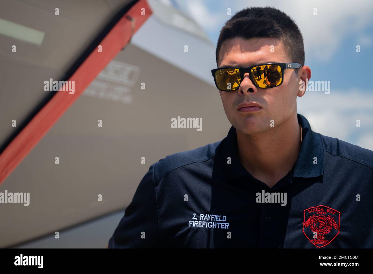 Zachary Rayfield, a firefighter assigned to Naval Support Activity ...