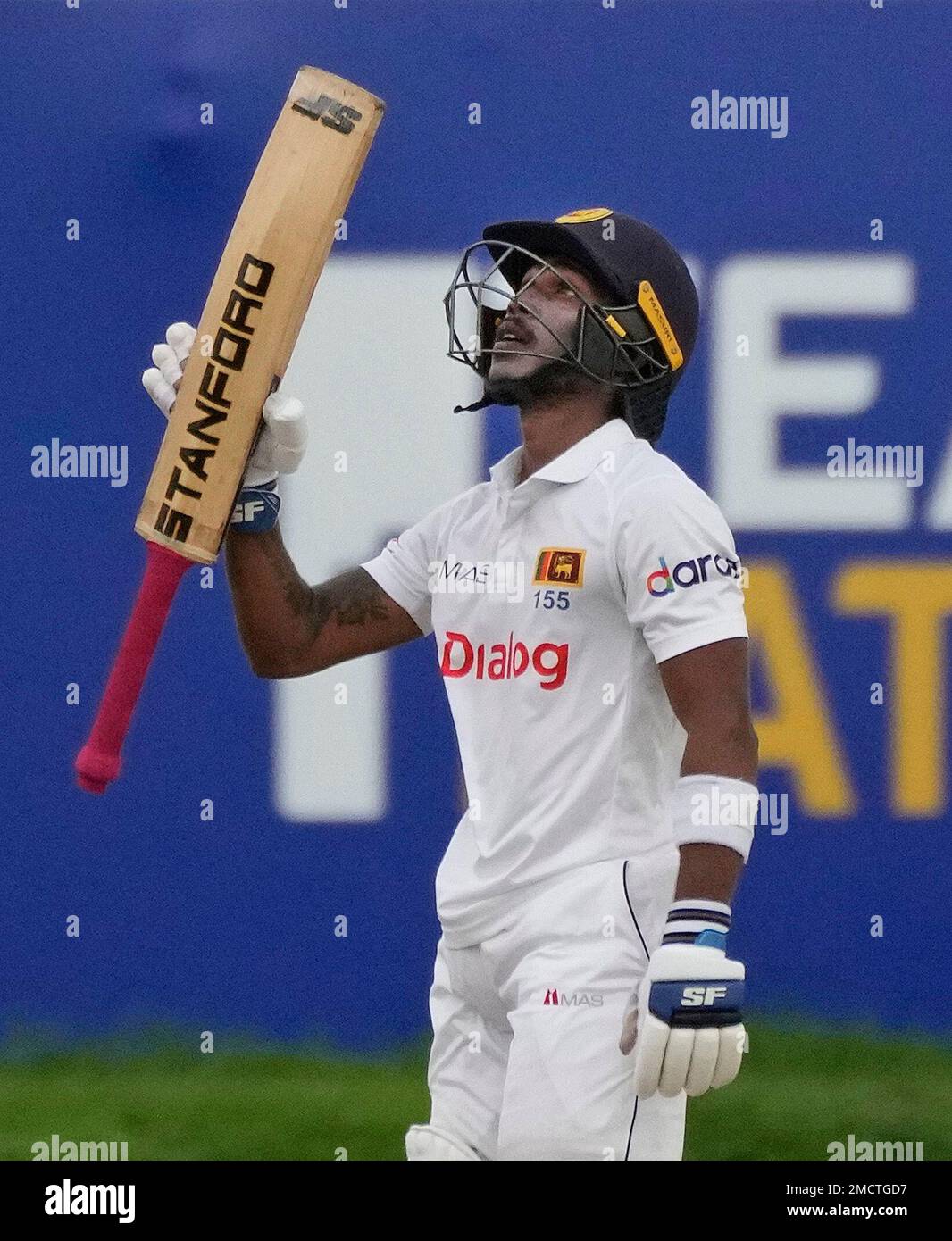 Sri Lanka's Pathum Nissanka raises his bat scoring a half century ...