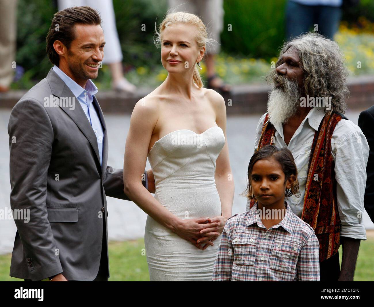 FILE - Australian Indigenous actor David Gulpilil, right, stands with ...