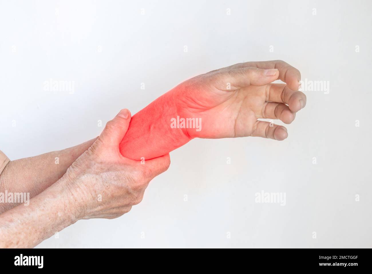 Inflammation at the wrist joint of Asian old woman. Concept of joint ...