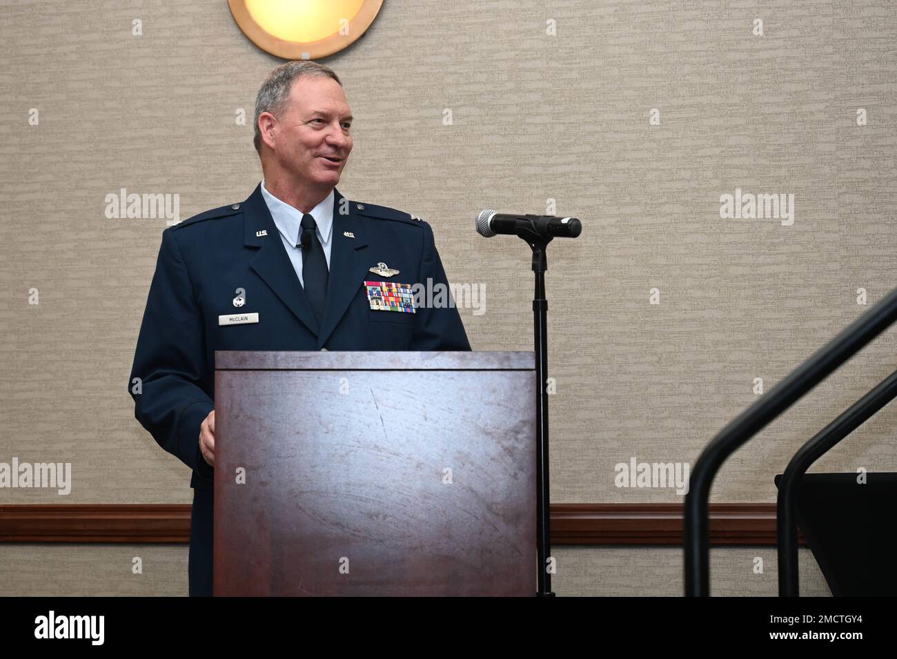 Col. Terry McClain, 433rd Airlift Wing commander, presides over the ...