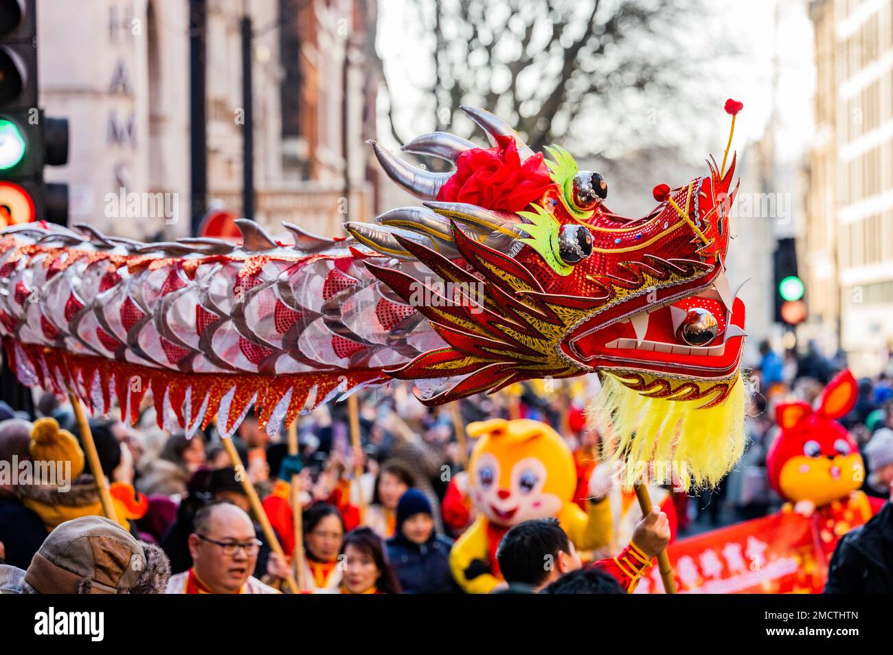London, UK. 22nd Jan, 2023. The annual parade led by drogon and lion dancers and the occassional ...