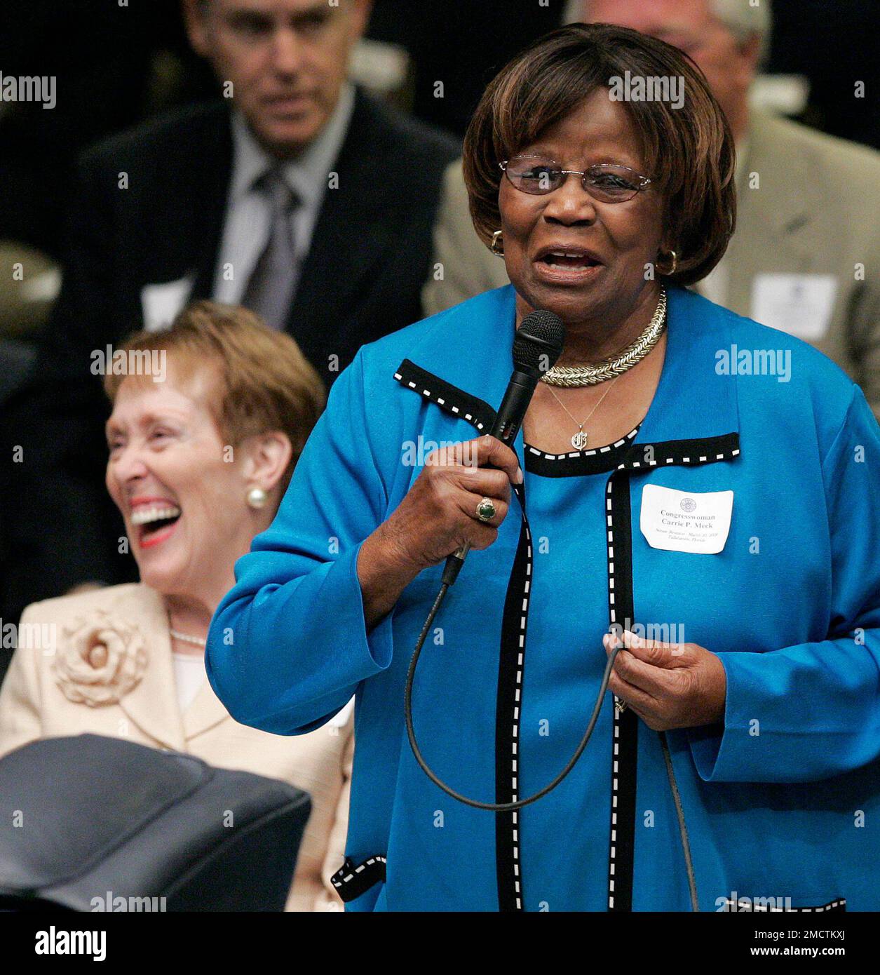 FILE - Former Florida Congresswoman Carrie Meek cracks up Betty Castor ...