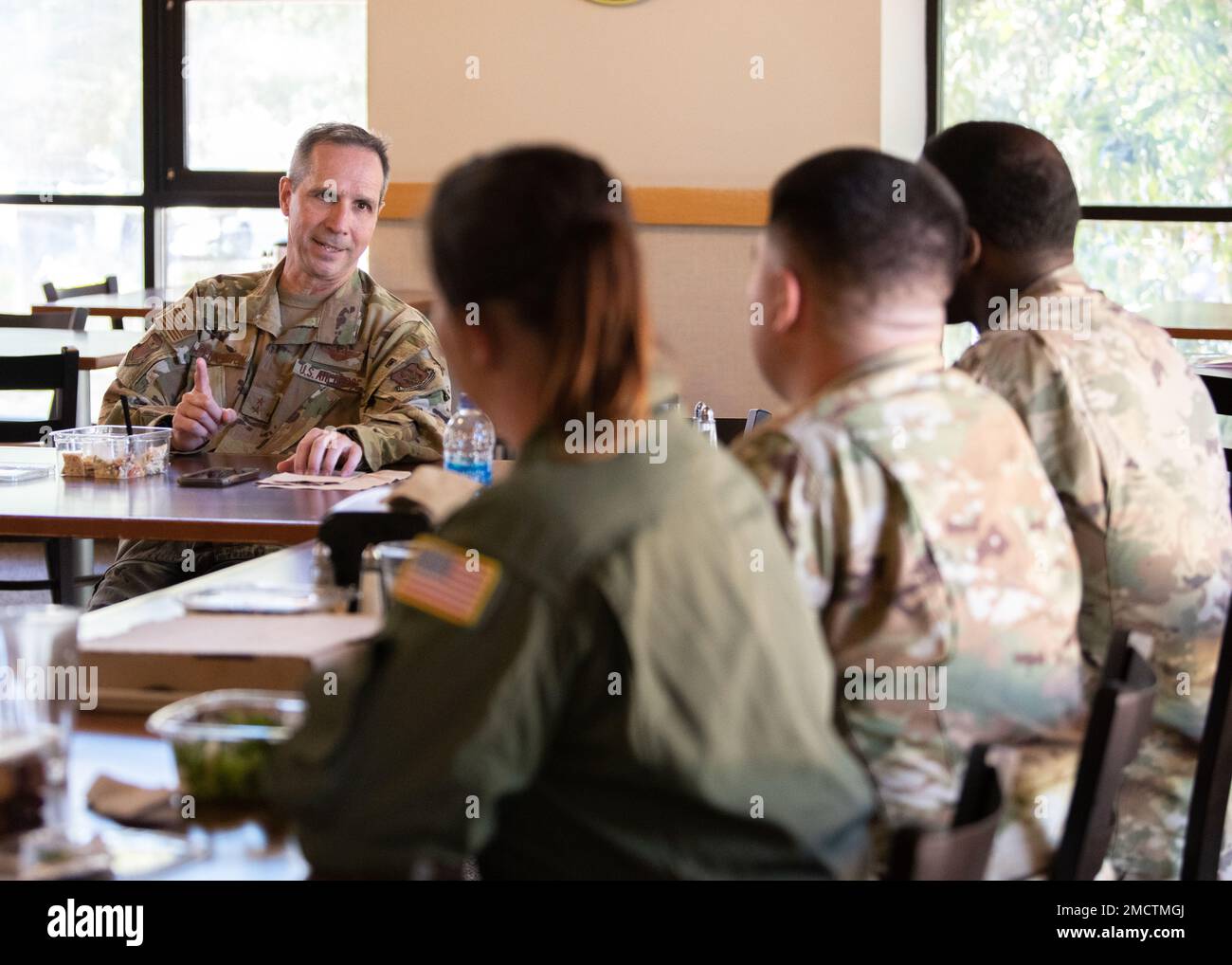 Maj. Gen. Jeffrey T. Pennington, 4th Air Force commander, takes a lunch ...
