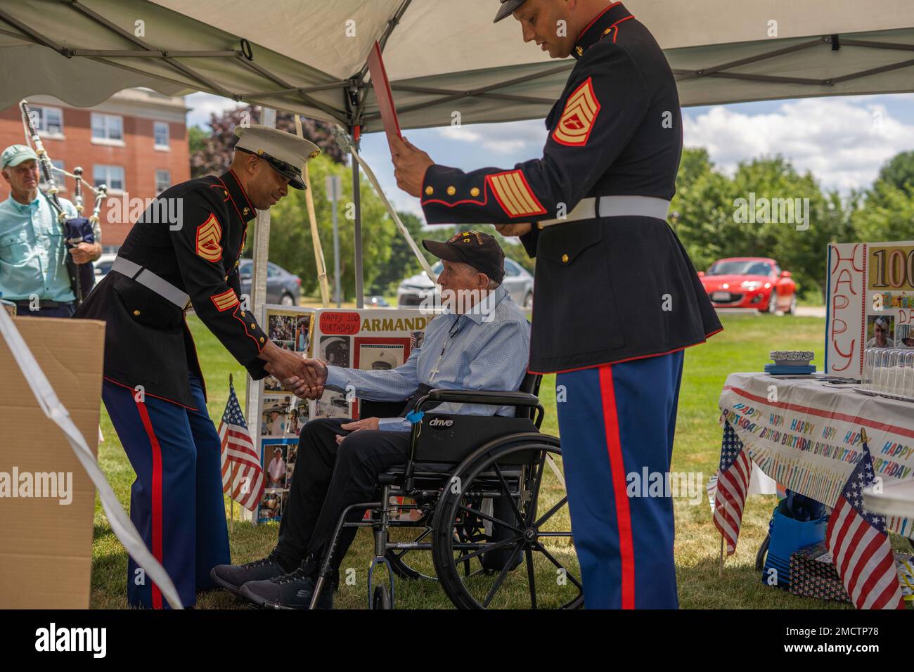 U.S. Marine Corps Gunnery Sgt. Jerod Richardson(left) with Officer ...