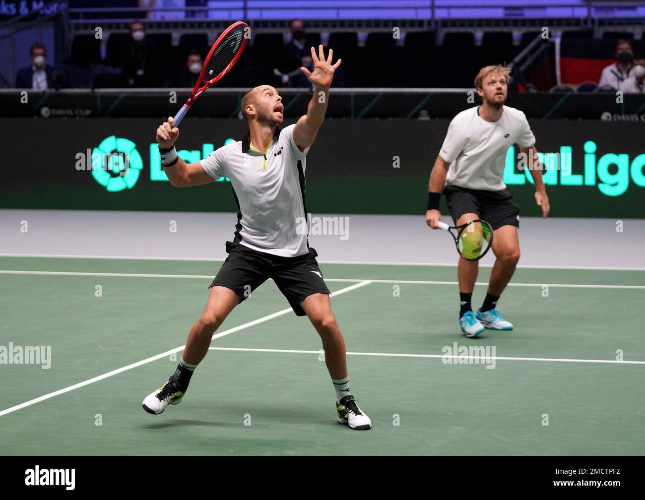 Germany's Tim Puetz, left, and Kevin Krawietz play doubles against ...
