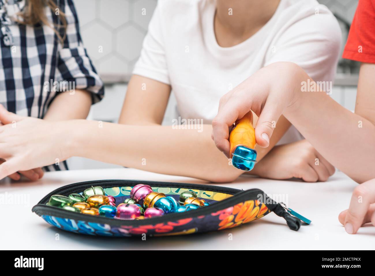 Children playing hand bells hi-res stock photography and images - Alamy