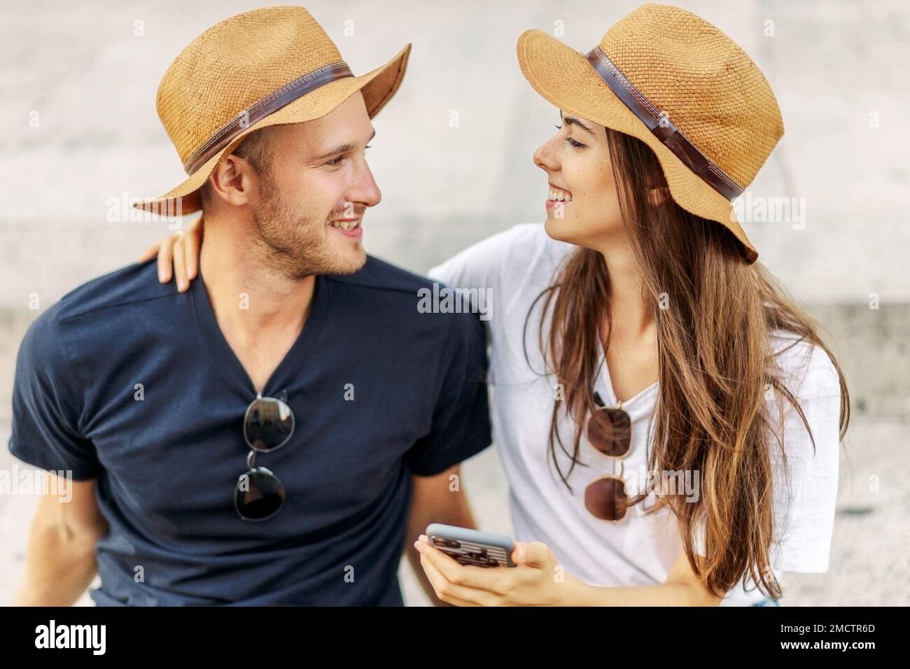 Happy Portrait of a happy young couple. A couple in love smiles and ...