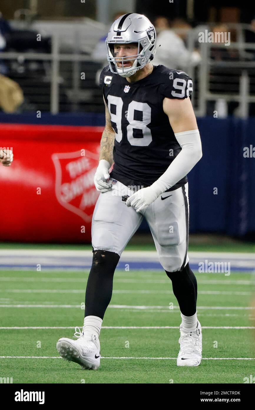 Las Vegas Raiders defensive end Maxx Crosby (98) jogs off the field ...