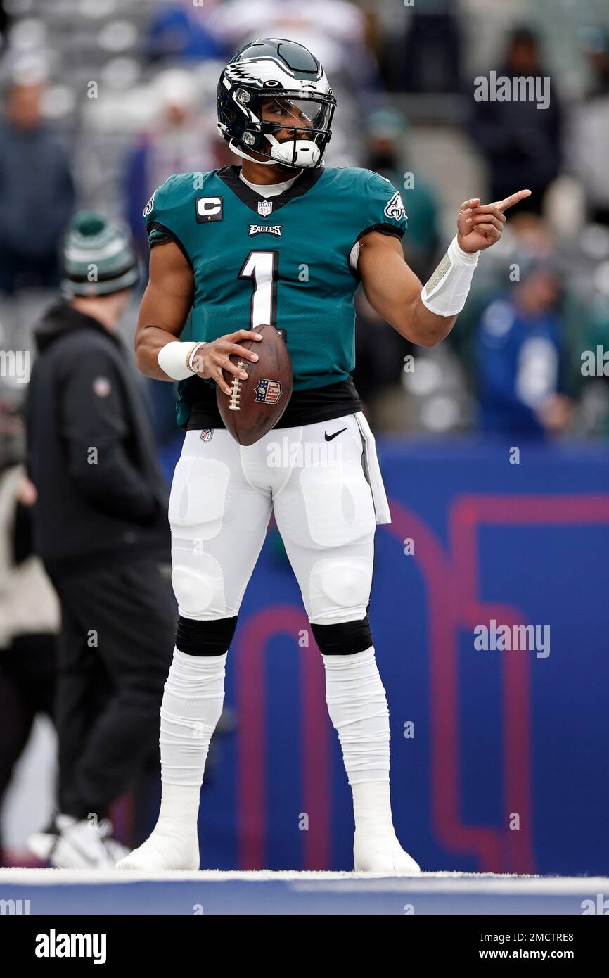 Philadelphia Eagles quarterback Jalen Hurts (1) warms up before taking ...