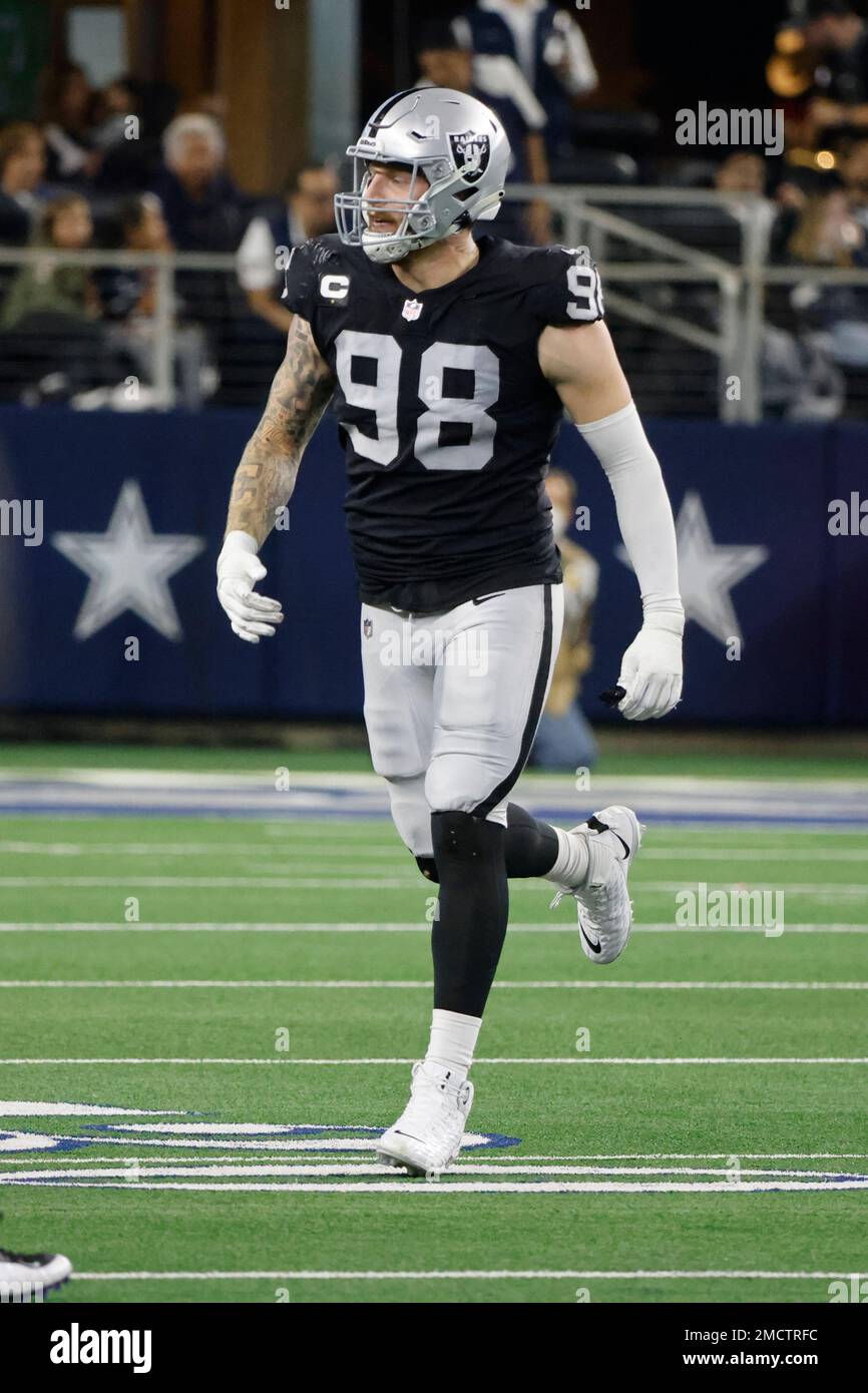 Las Vegas Raiders defensive end Maxx Crosby (98) jogs off the field ...