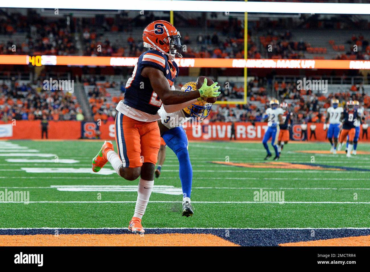 Syracuse defensive back Darian Chestnut intercepts a pass intended for ...