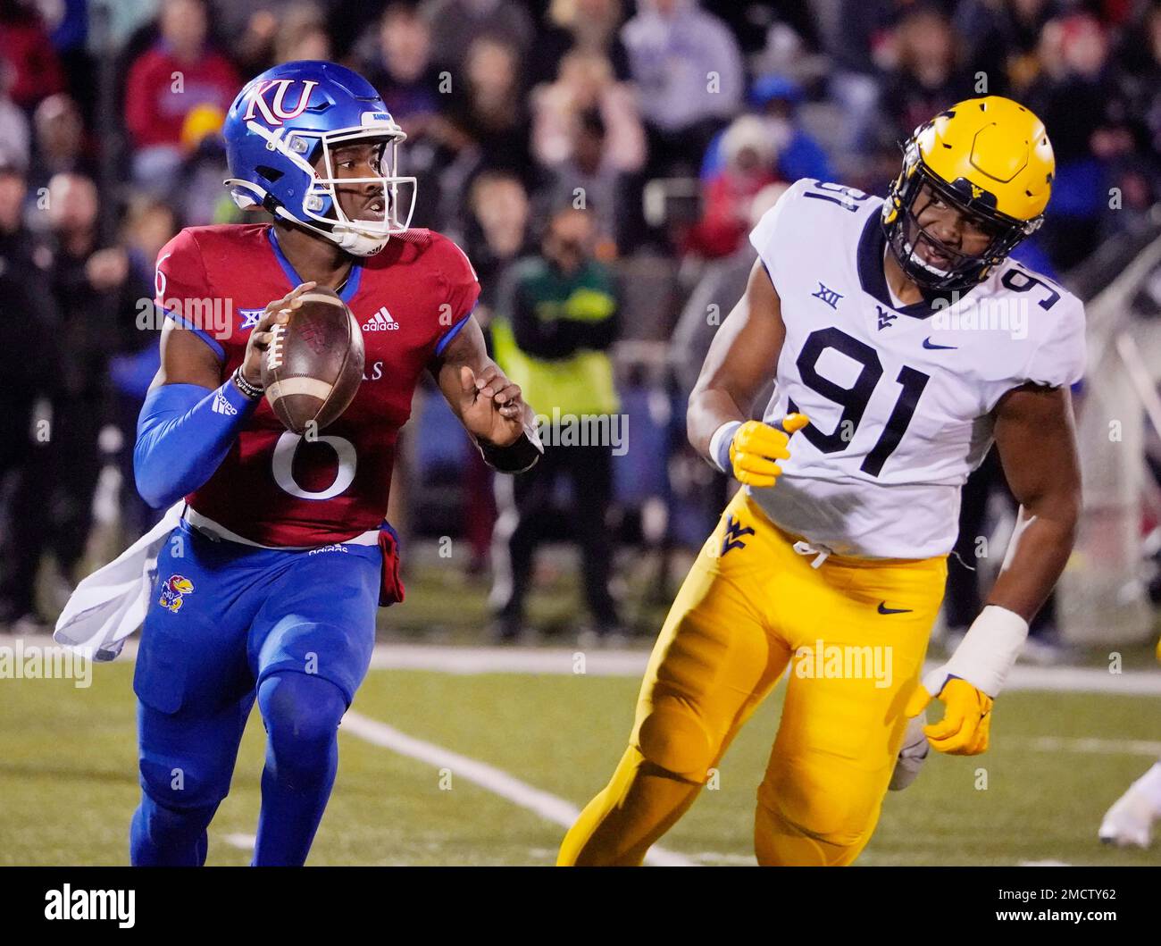 Kansas quarterback Jalon Daniels (6) looks to pass against West ...