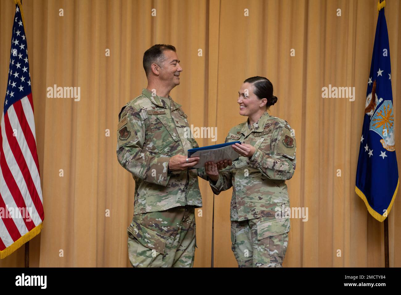 Col. David R. Lands, 192nd Mission Support Group commander, presents a ...