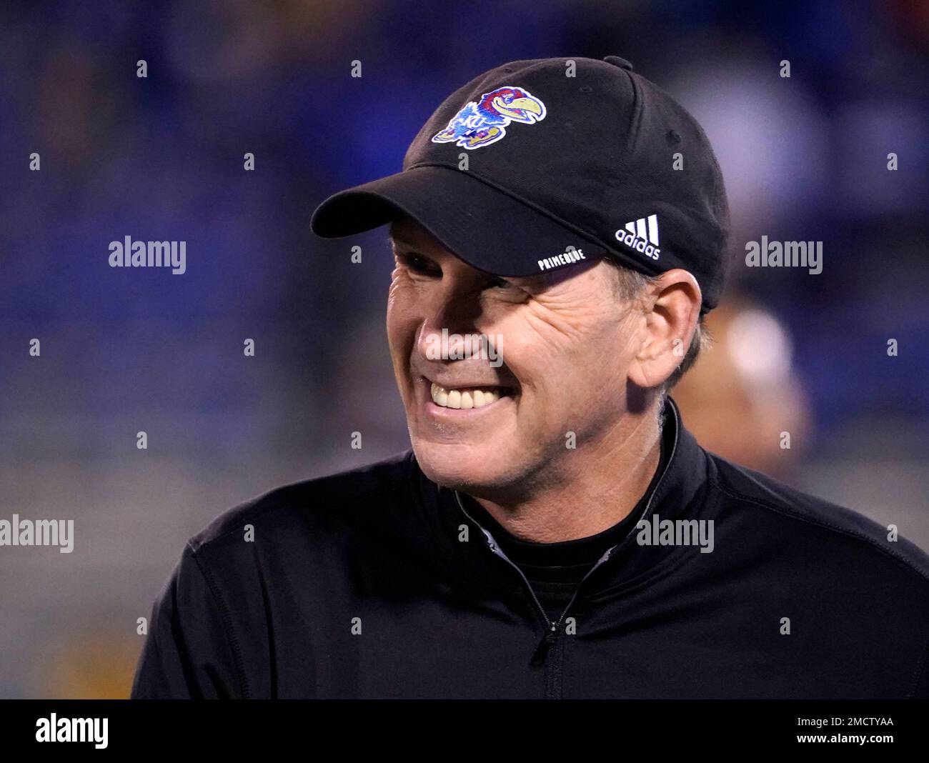 Kansas head coach Lance Leipold watches his team warm up prior to an ...
