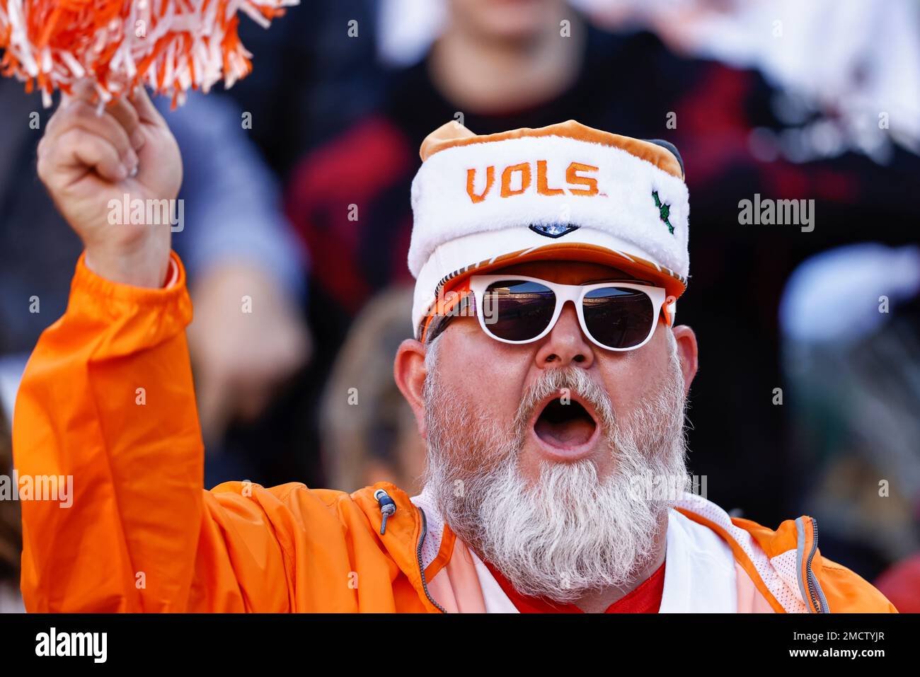 A Tennessee fan yells during the first half of an NCAA college football ...