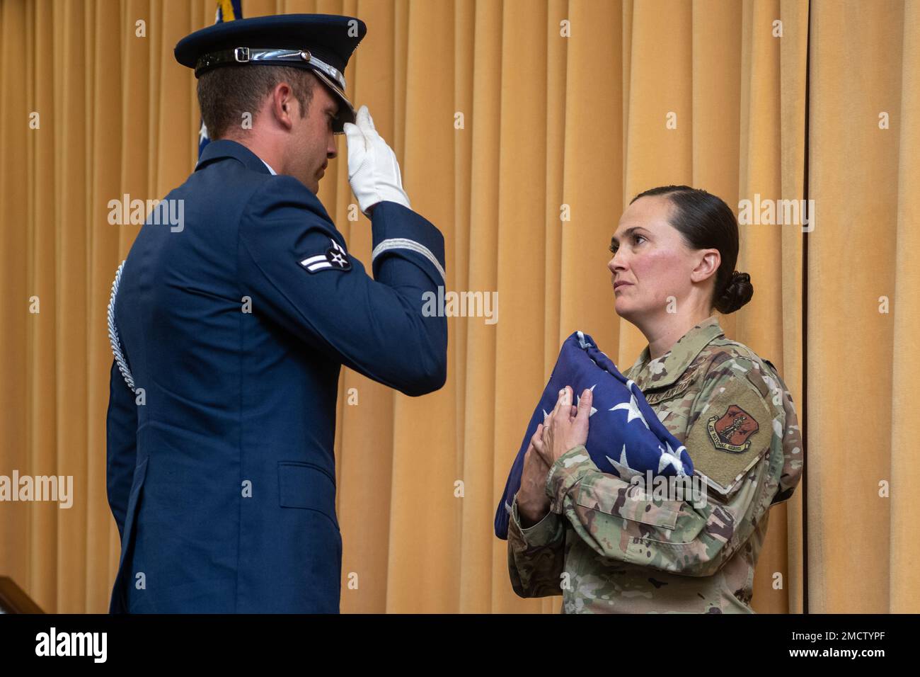 The Joint Base Langley-Eustis honor guard performs the ceremonious flag ...