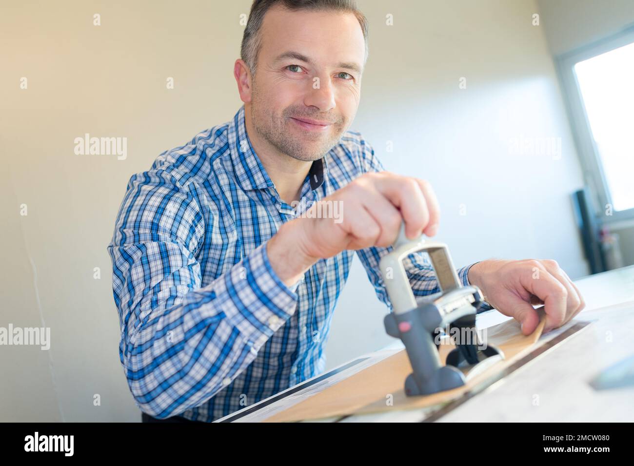 man with stamp looking at the camera Stock Photo - Alamy
