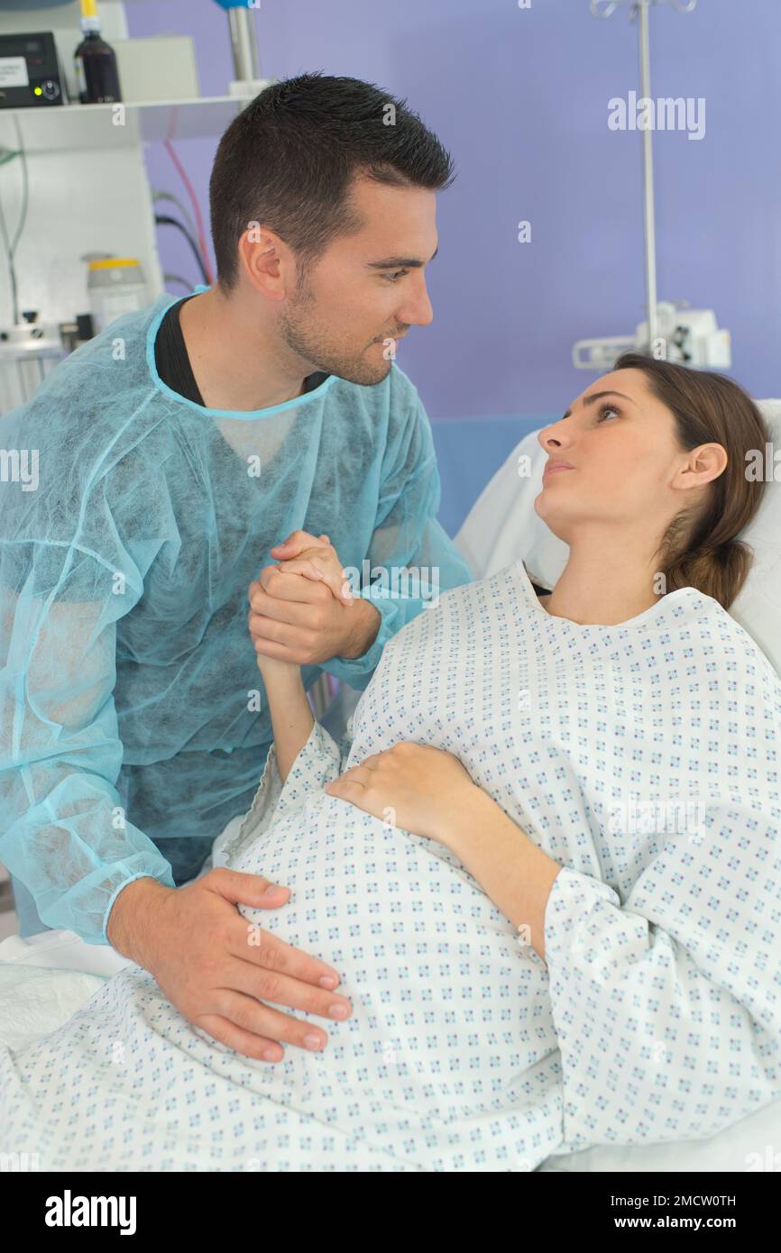 man supporting his partner through childbirth Stock Photo - Alamy