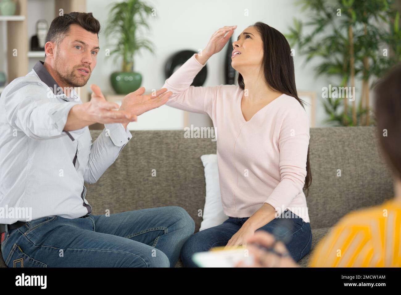 couple having an argument during therapy session Stock Photo - Alamy