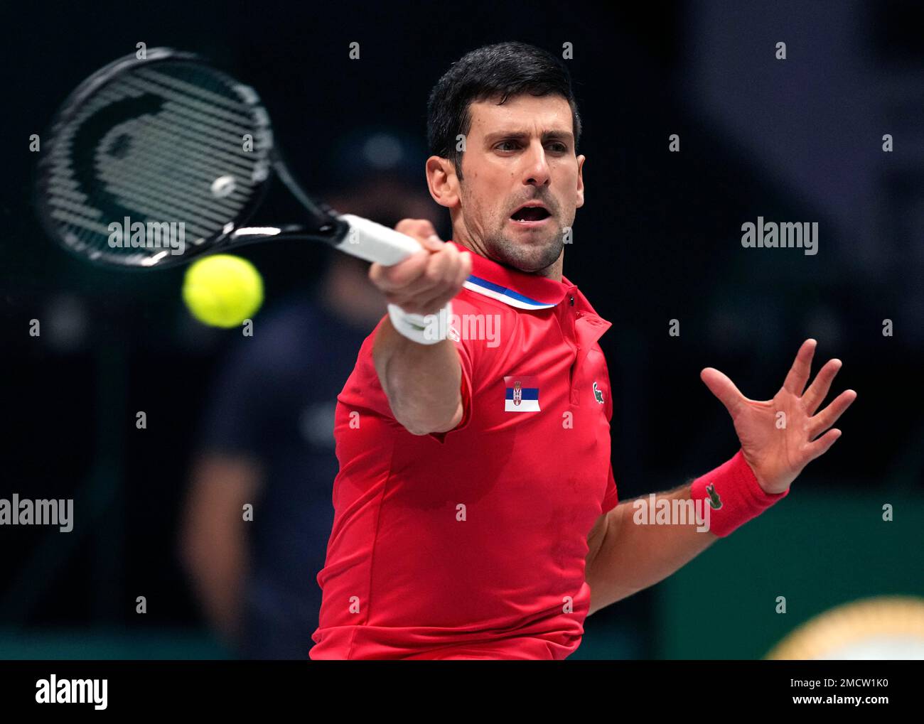 Serbia's Novak Djokovic hits a forehand against Germany's Jan-Lennard ...