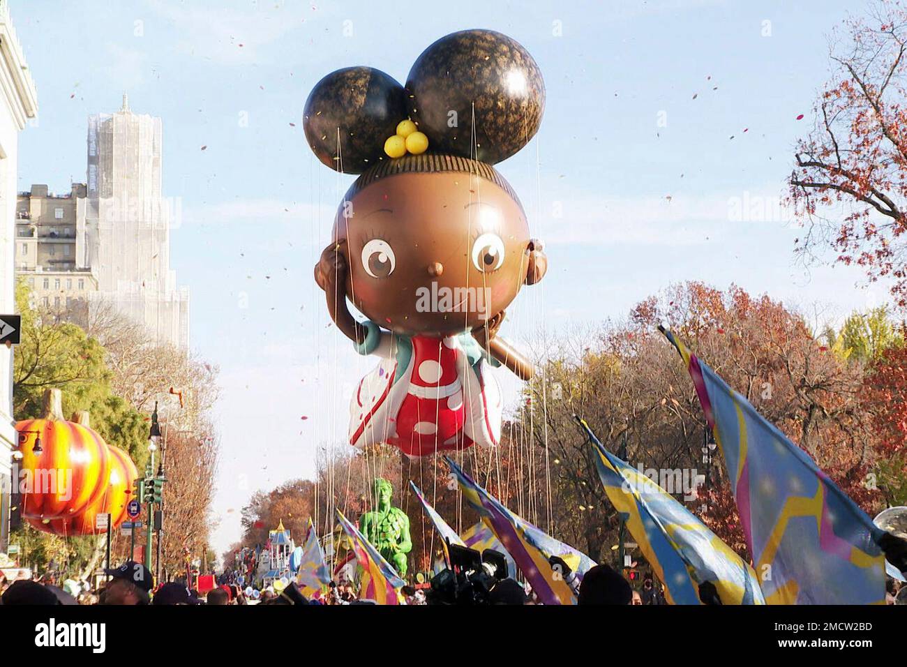 Handlers pull an Ada Twist giant character helium balloon down Central ...