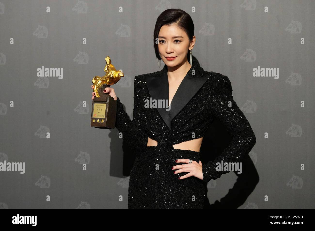 Taiwanese actress Alyssa Chia holds her award for Best Leading Actress ...