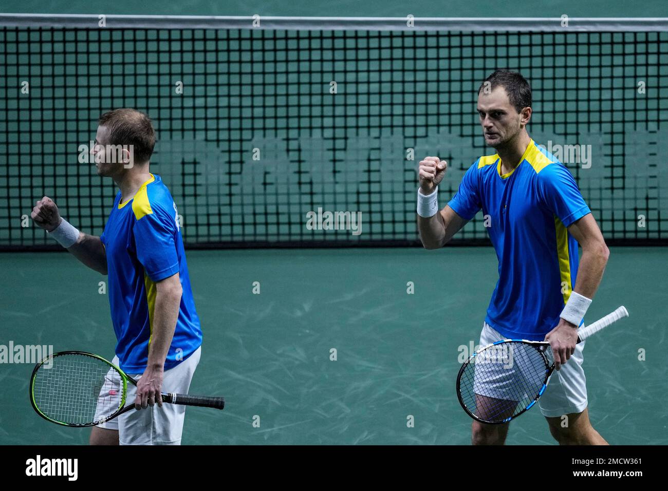 Kazakhstan's Andrey Golubev, right, and Aleksandr Nedovyesov compete ...