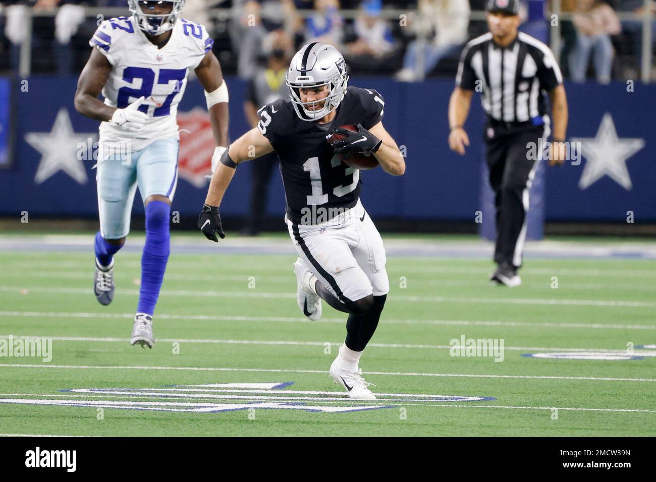 Las Vegas Raiders wide receiver Hunter Renfrow (13) runs after a ...