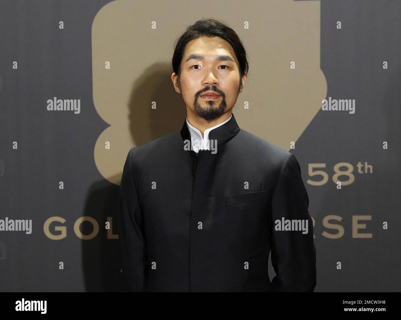 Taiwanese director Jun Li arrives at the 58th Golden Horse Awards in ...