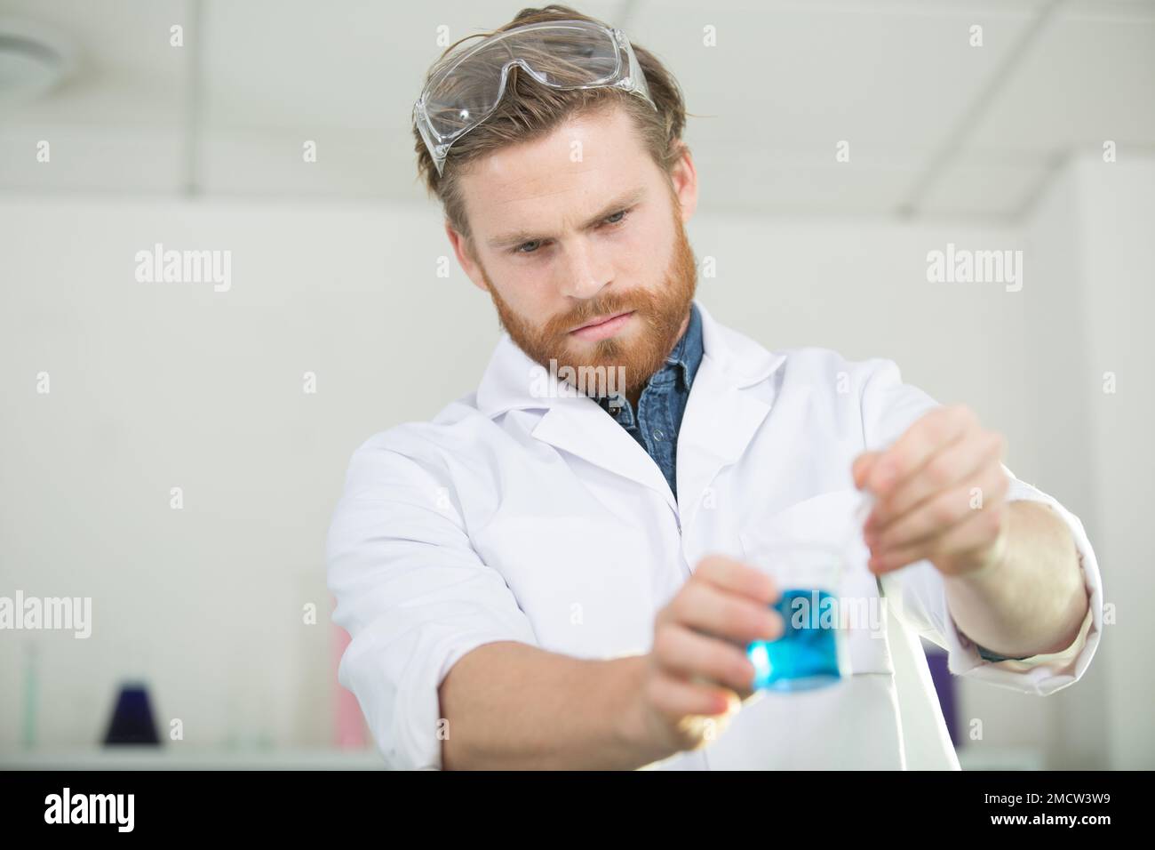 male medical or scientific laboratory researcher Stock Photo - Alamy