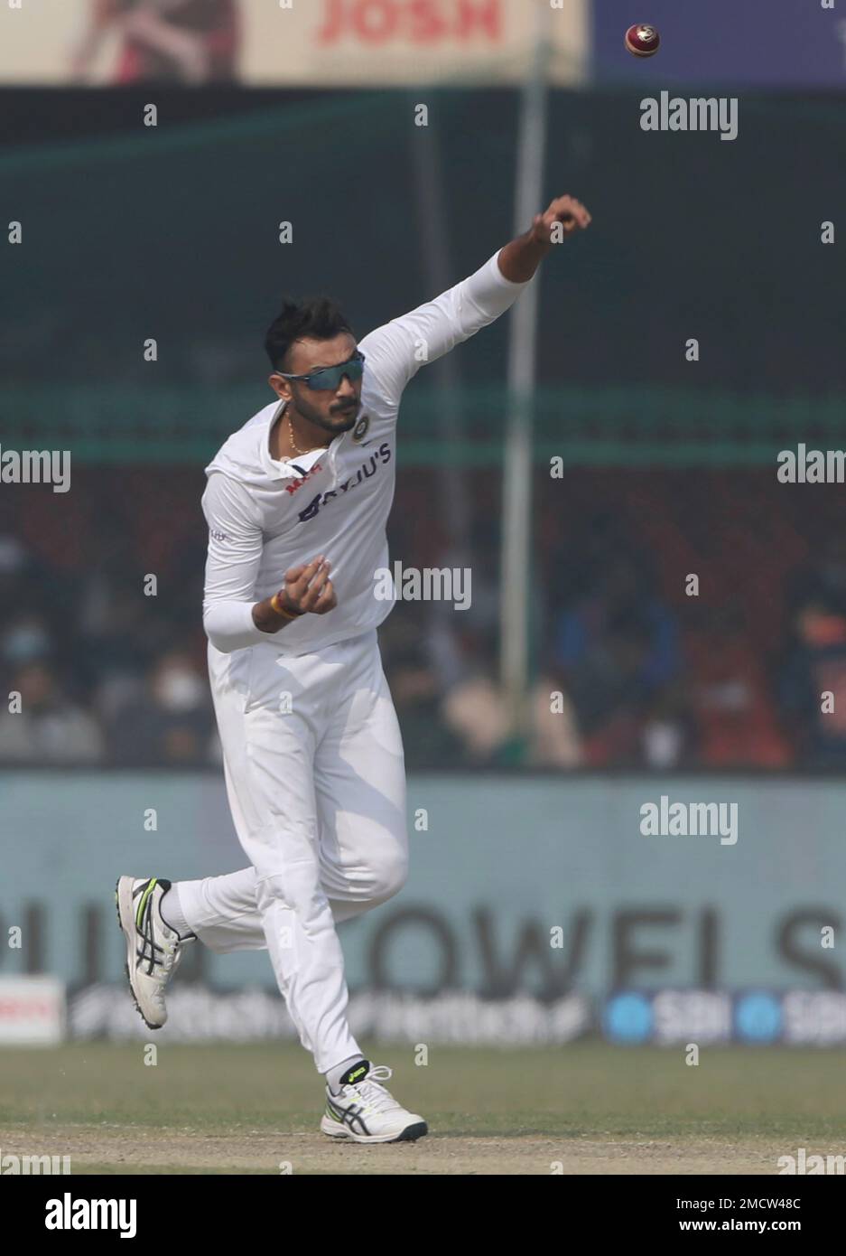 India's Axar Patel bowls during the day three of their first test ...