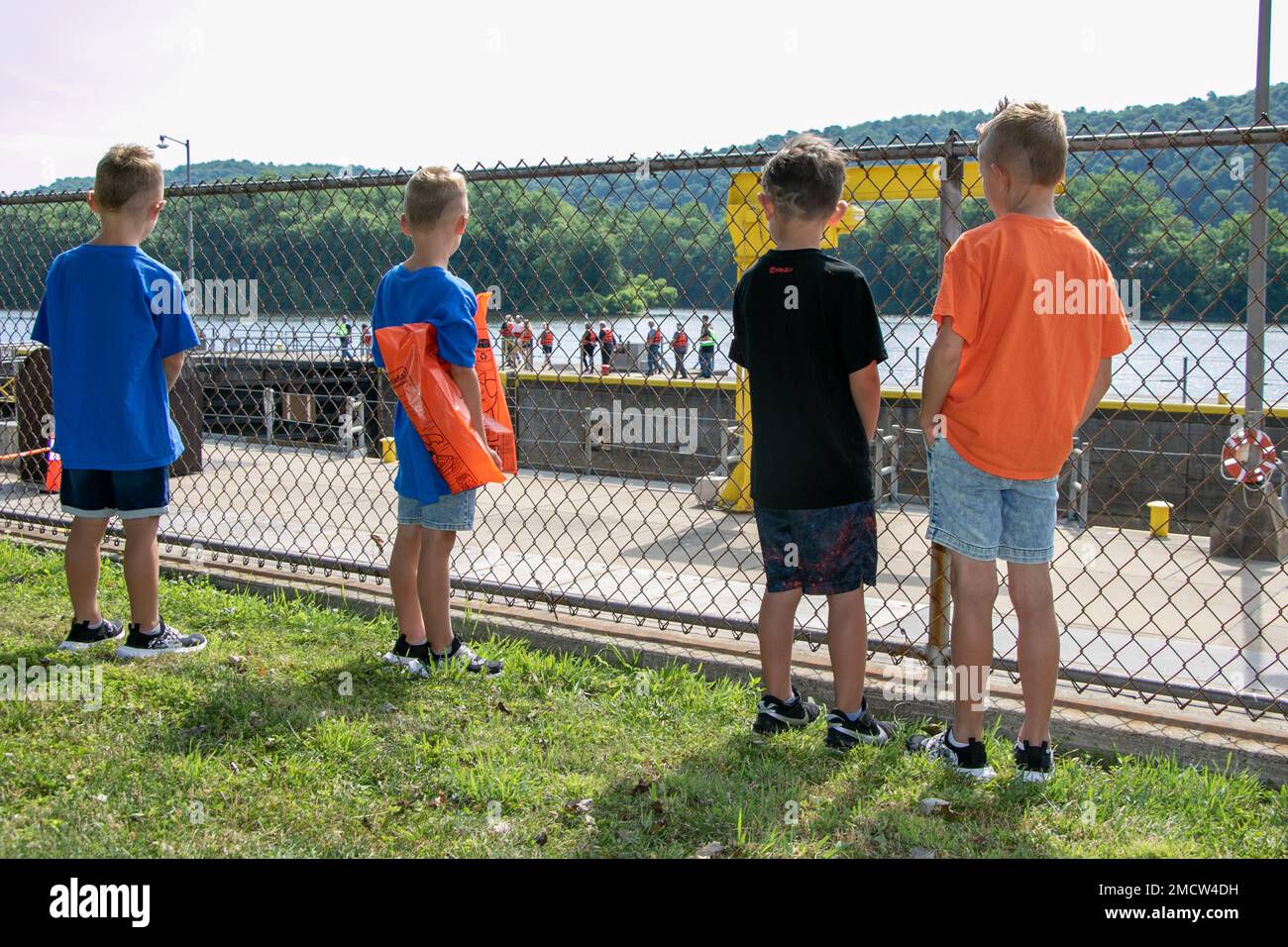 A group of boys watch the first tour of Lock Fest given by Lockmaster ...