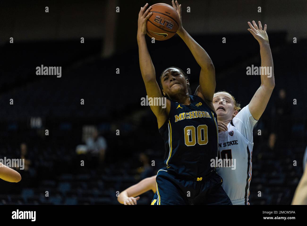 Nah Hillmongoing up for the rebound during an NCAA basketball game on ...