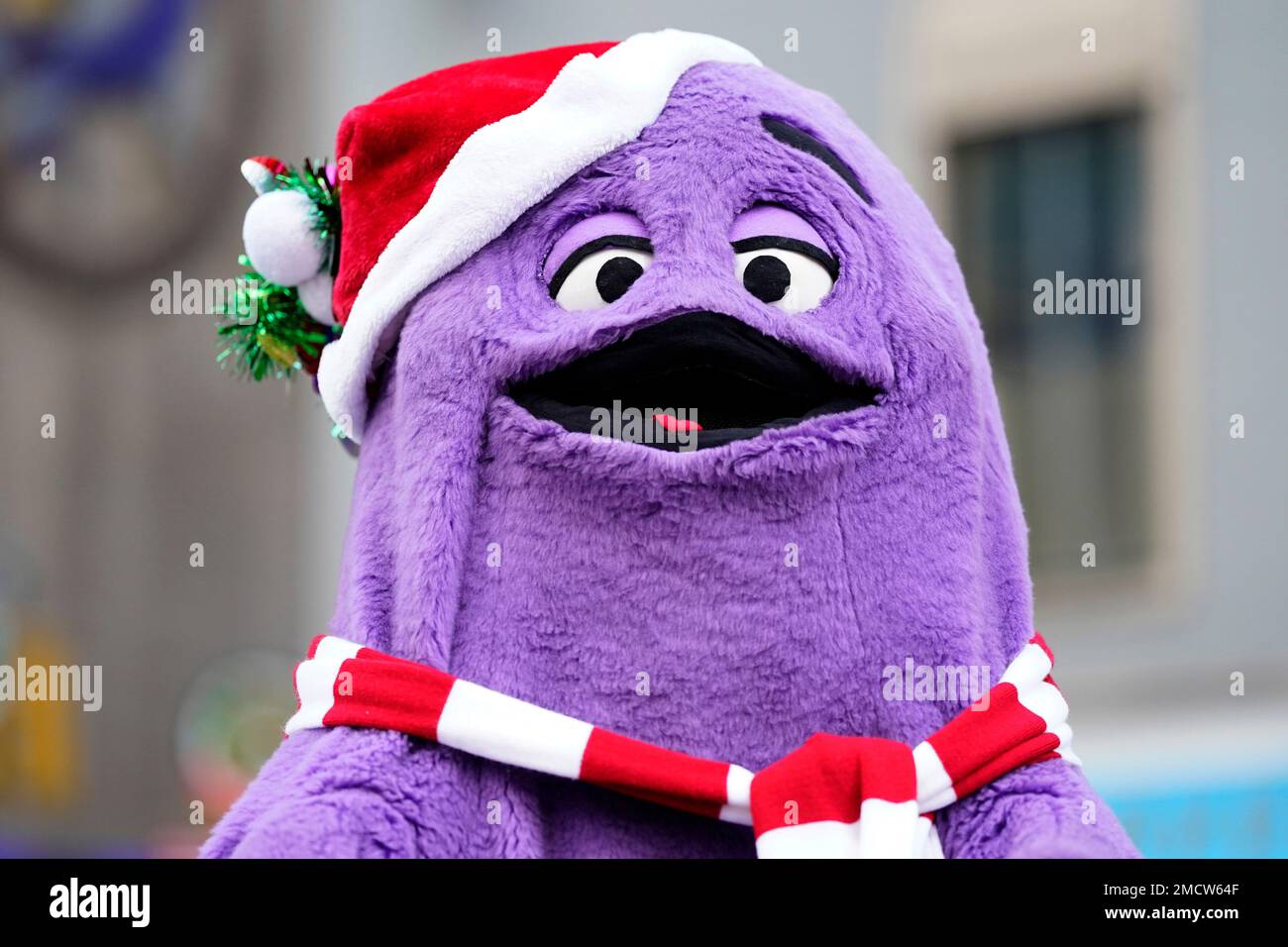 McDonald's Grimace rides a float in the Macy's Thanksgiving Day Parade ...