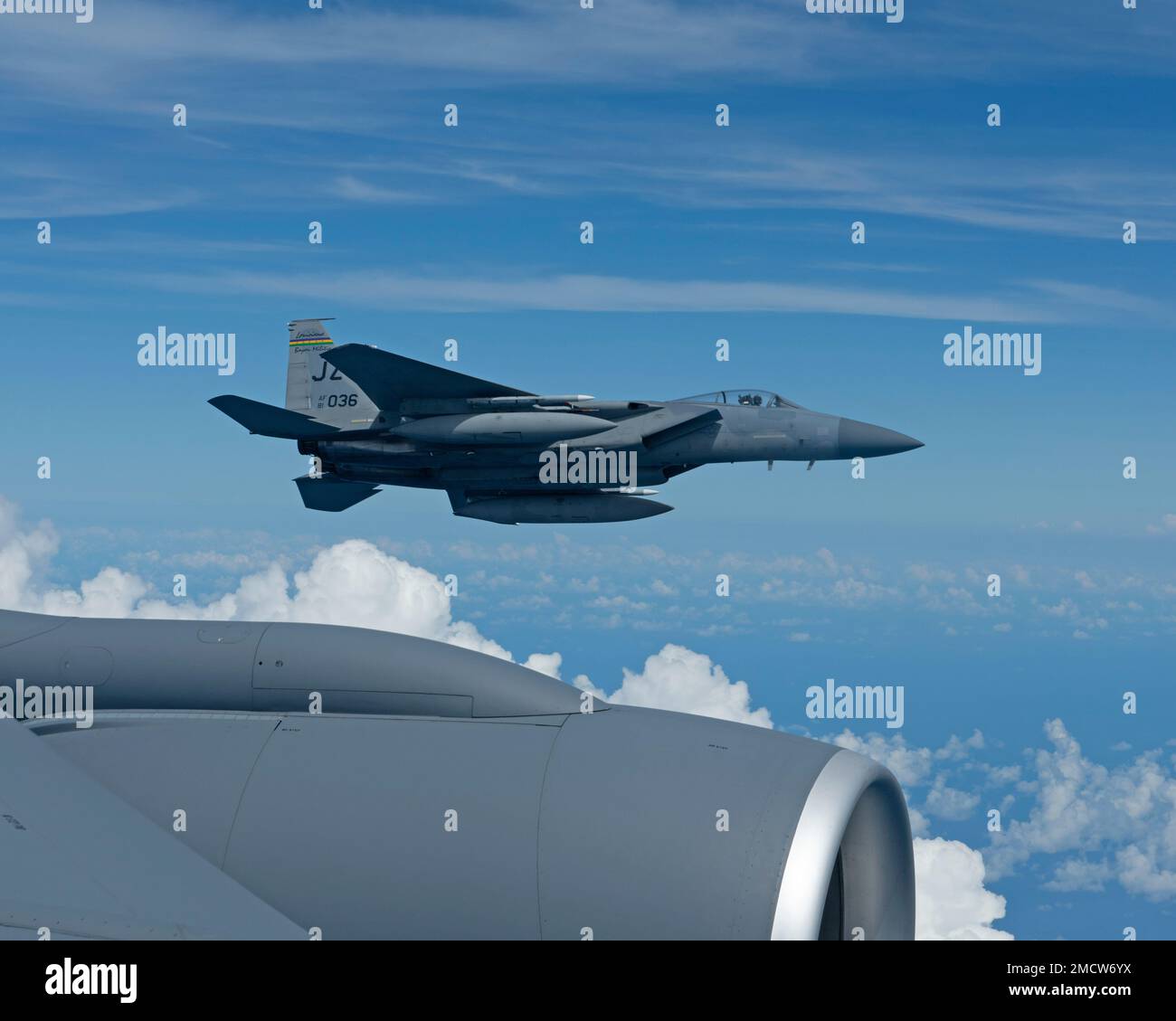 An F-15 Eagle with the 159th Fighter Wing, Louisiana, flies next to a ...
