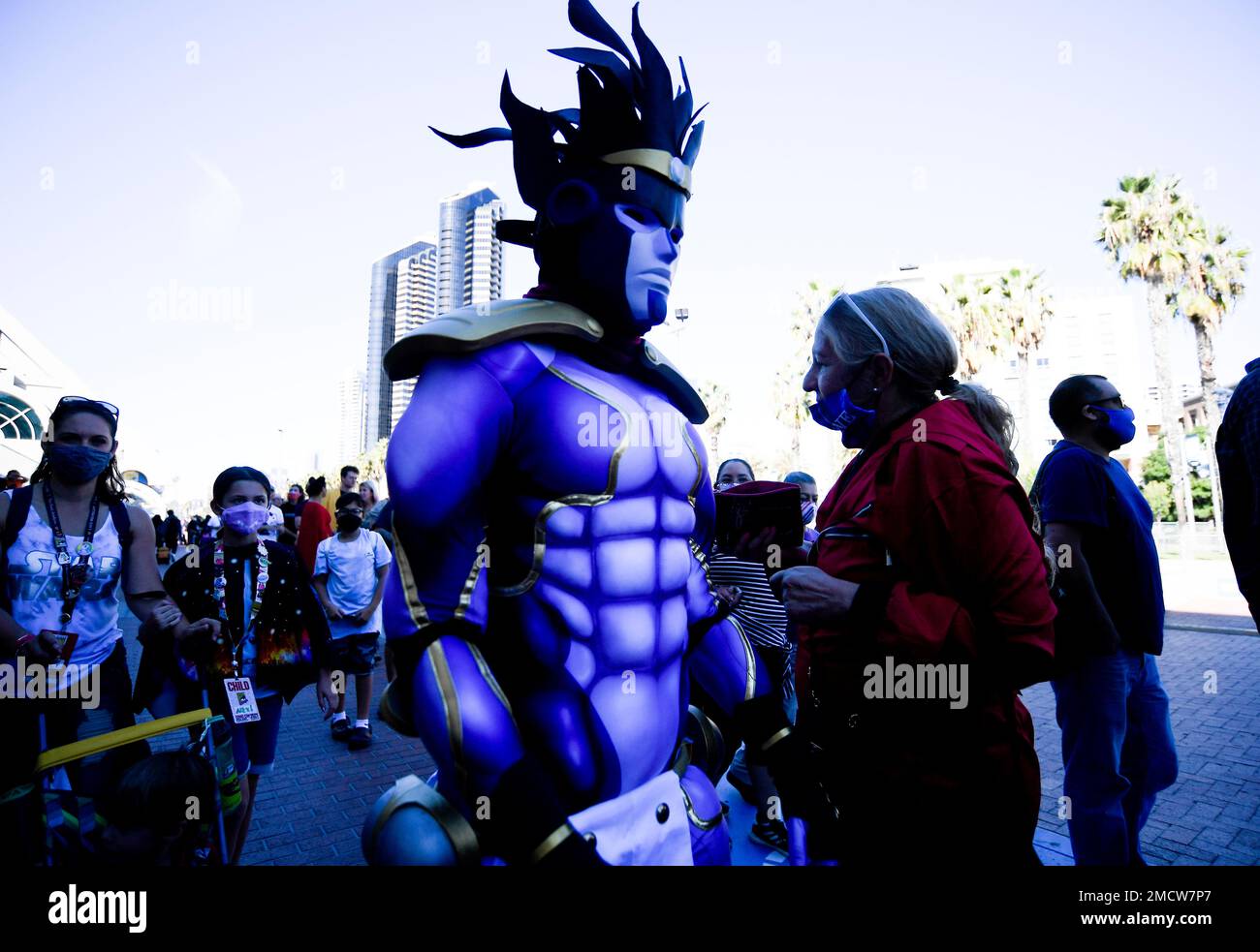 Erik Radillo walks in front of the convention center on day one of ...