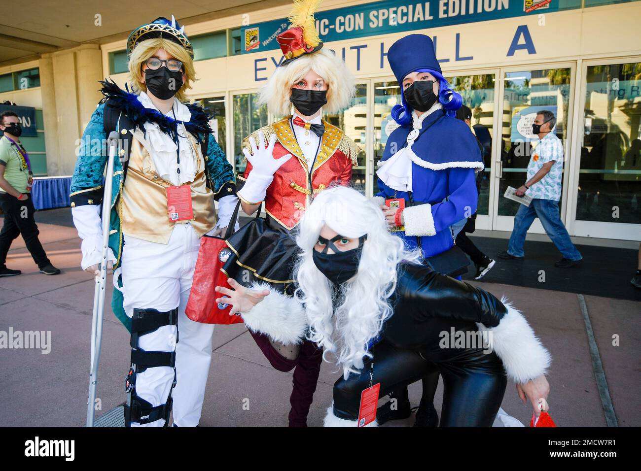 Costumed characters pose in front of the convention center on Day 1 of ...