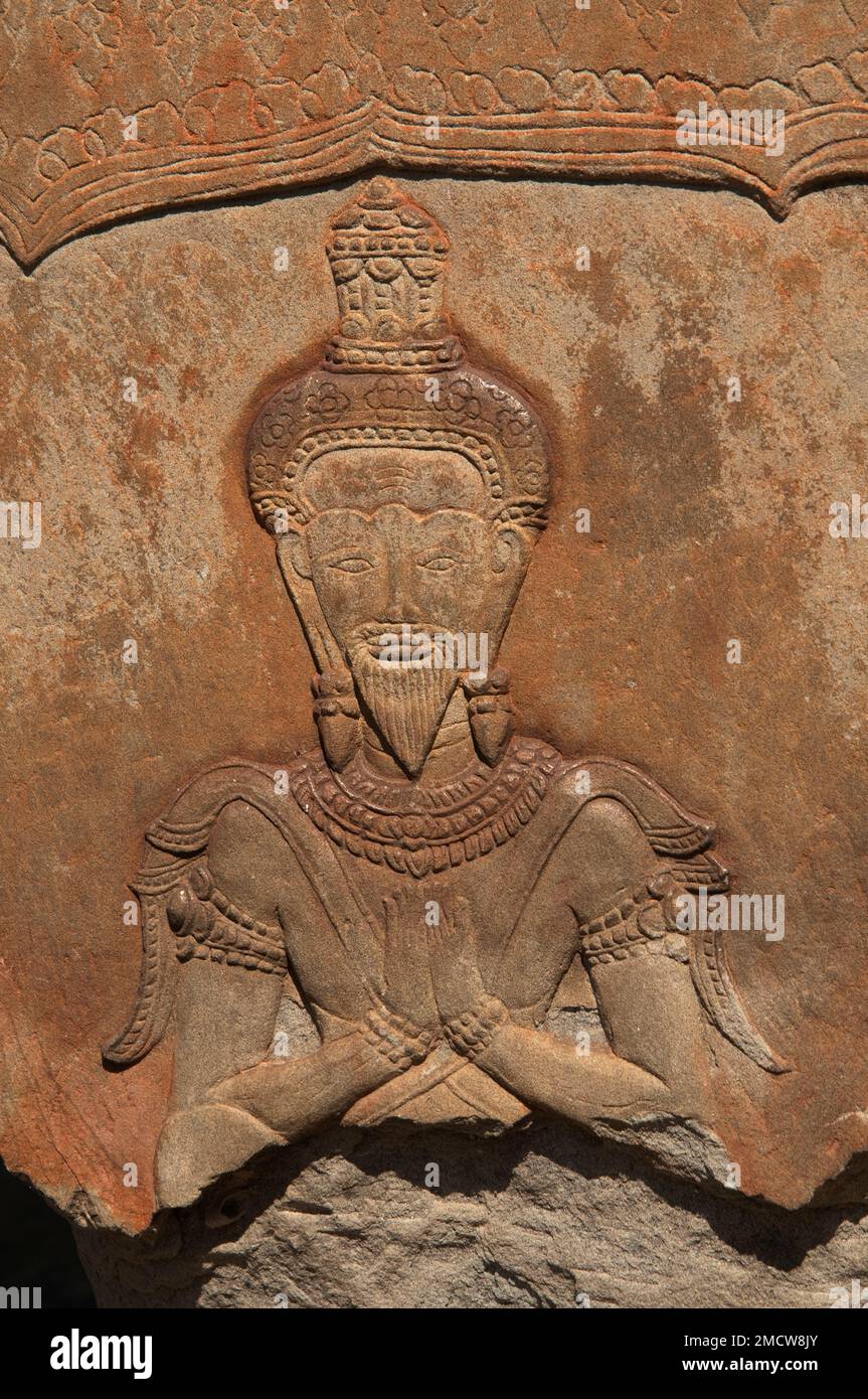Crumbling carvings of holy man, Angkor Wat temple, Siem Riep, Cambodia ...
