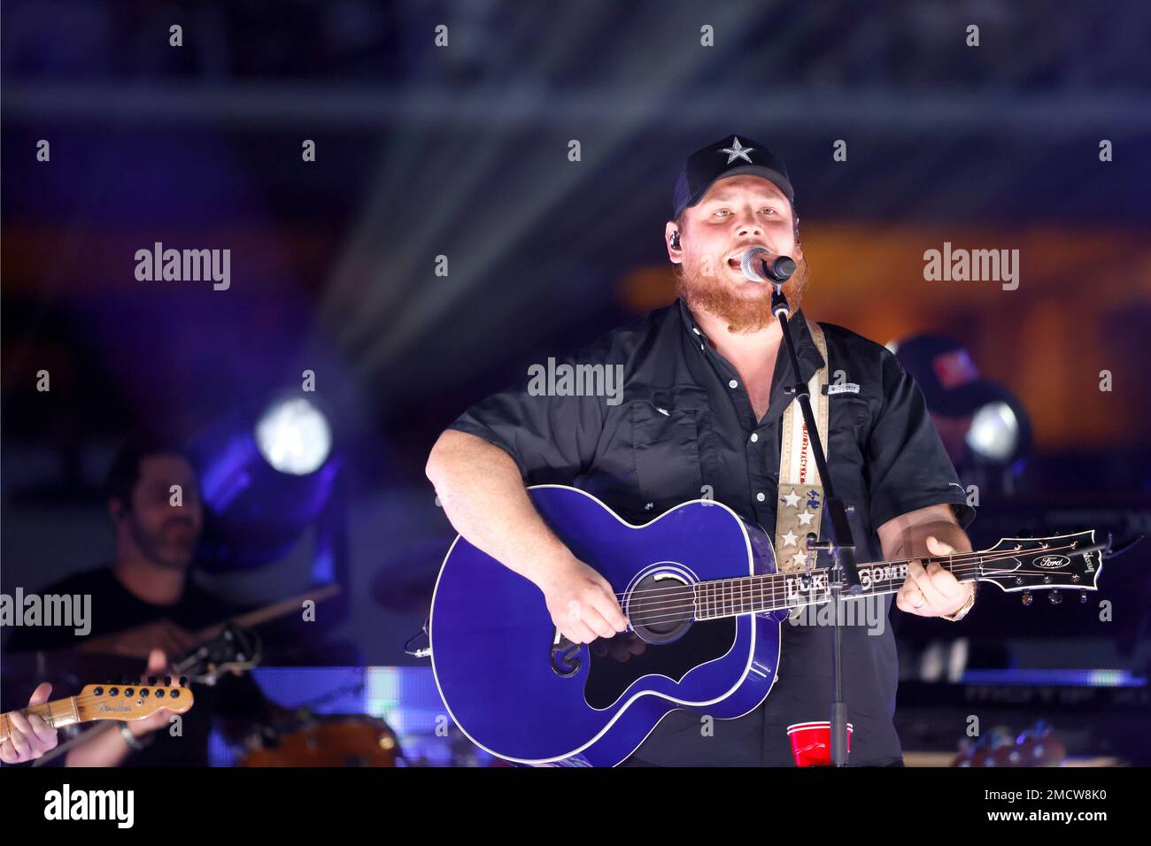 Luke Combs performs at halftime of an NFL football game between the Las ...
