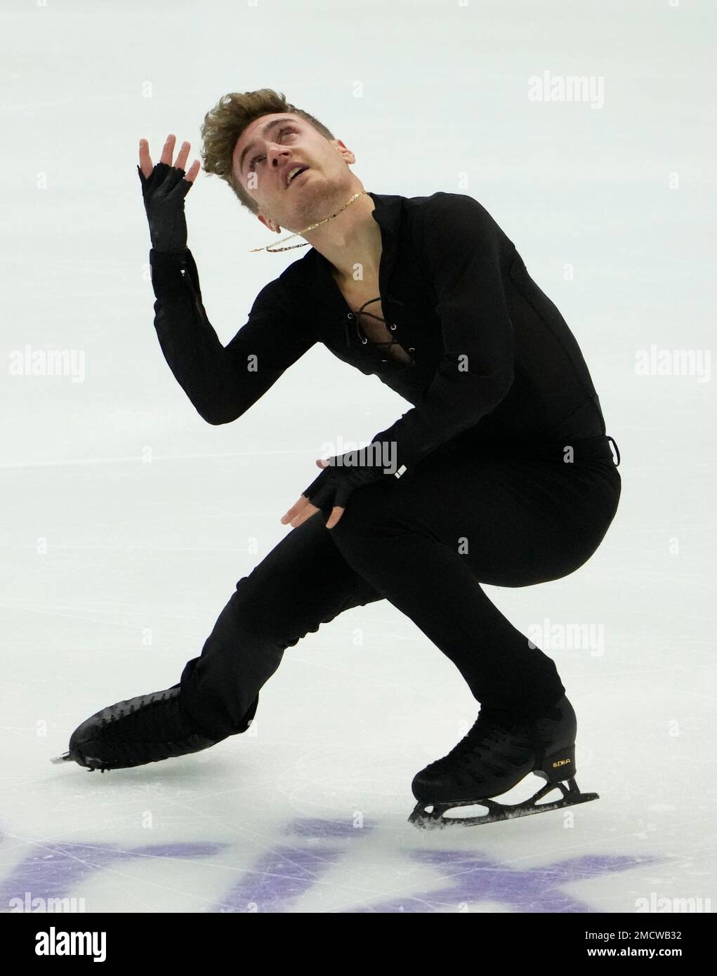 Italy's Matteo Rizzo performs in the men short skating program during ...