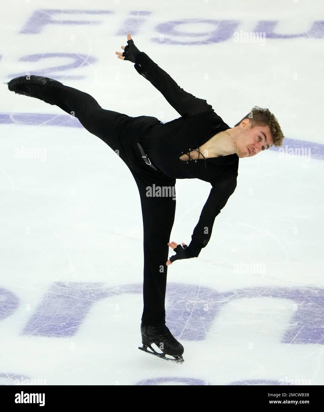 Italy's Matteo Rizzo performs in the men short skating program during ...