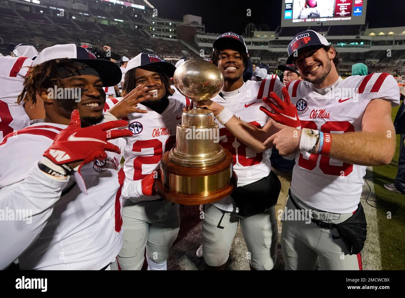 Mississippi players celebrate their win over Mississippi State and ...