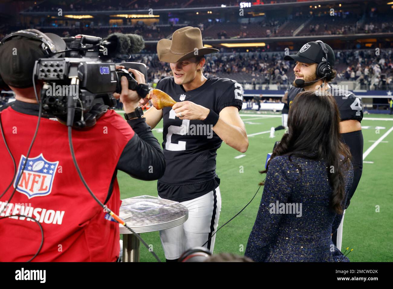 Las Vegas Raiders place kicker Daniel Carlson (2) prepares to take a ...