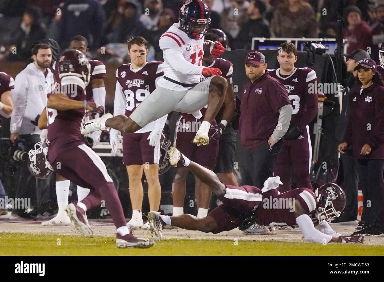 Mississippi wide receiver Dontario Drummond (11) leaps over a fallen ...