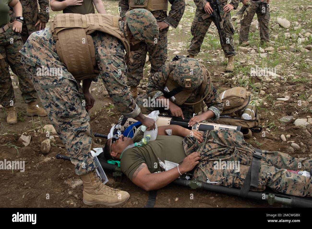 U.S. Navy Sailor Lt. Rodney Posely, left, and hospital corpsmen 3rd ...