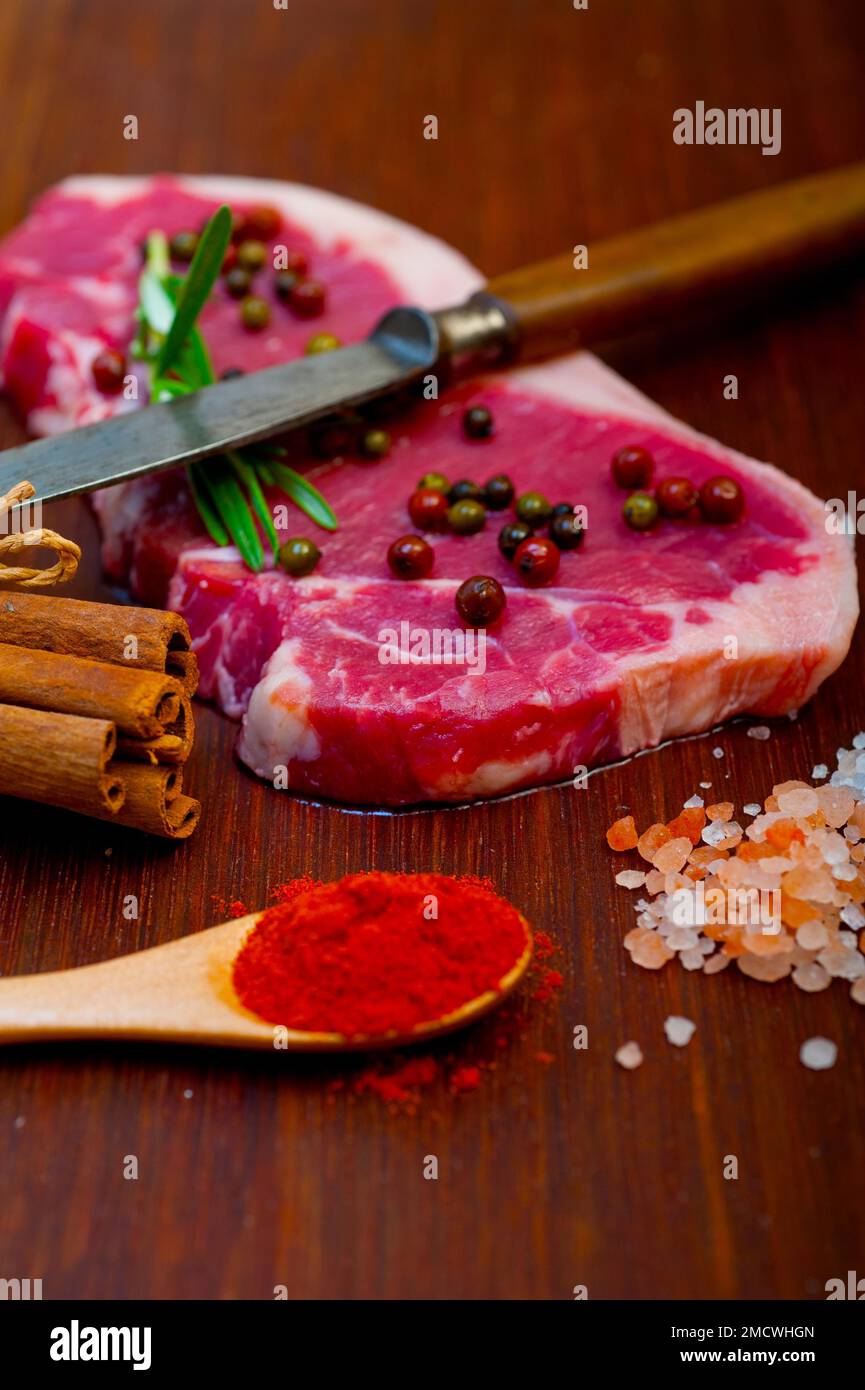 Raw uncooked ribeye beef steak butcher selection Stock Photo - Alamy
