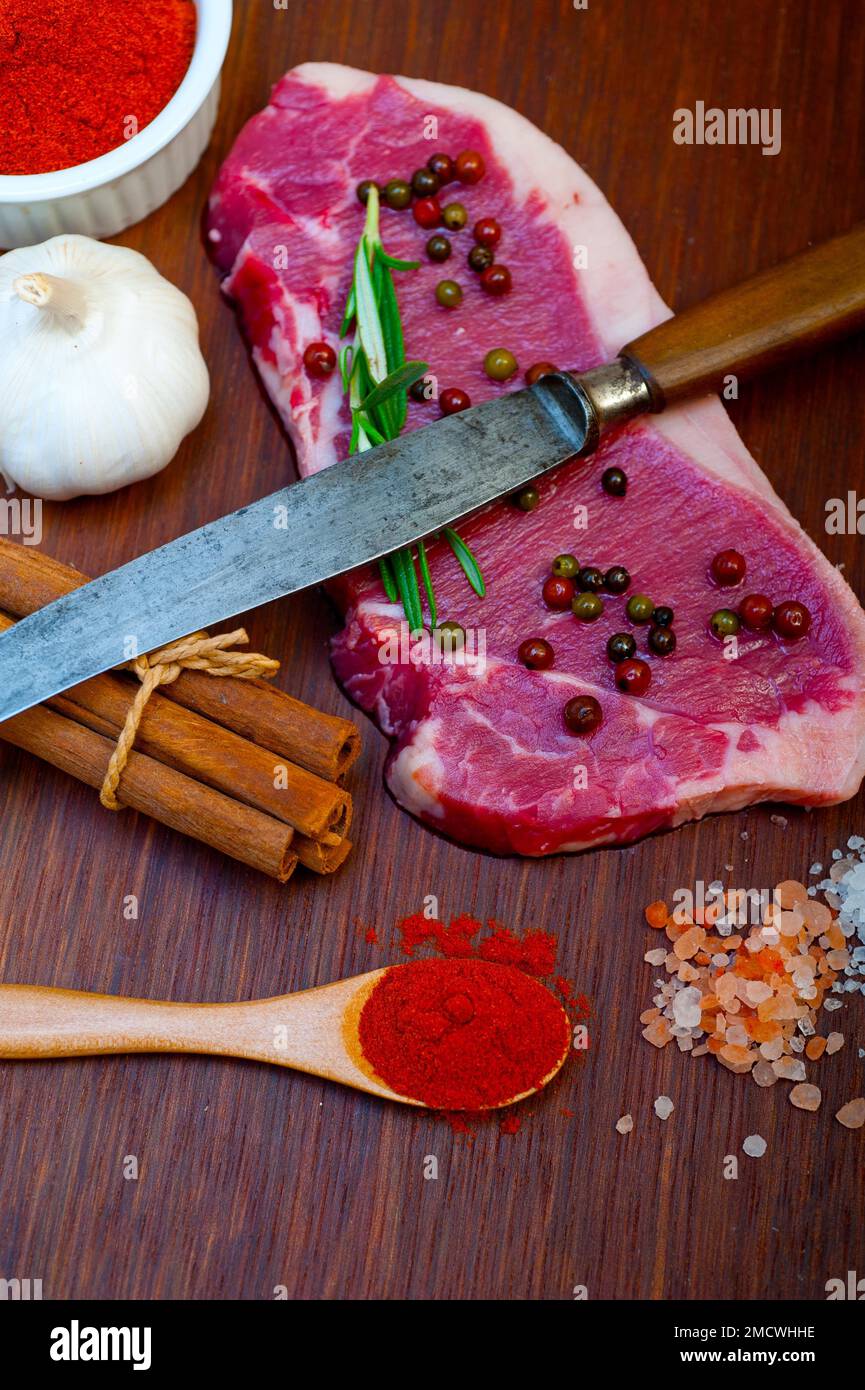 Raw uncooked ribeye beef steak butcher selection Stock Photo - Alamy