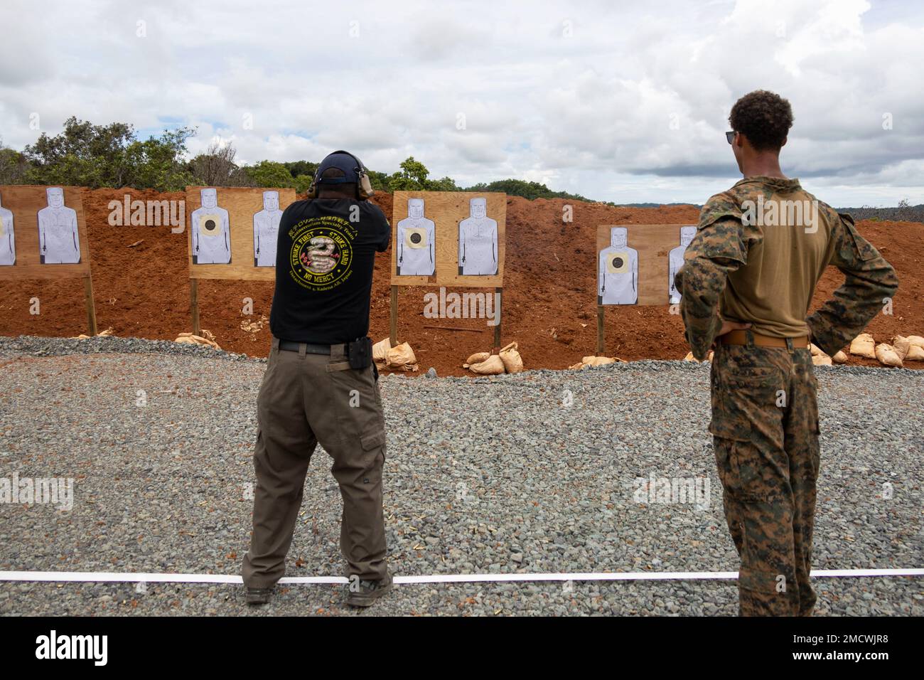 U.S. Marine Corps Cpl. Ty Krotz, a range coach with Task Force Koa ...